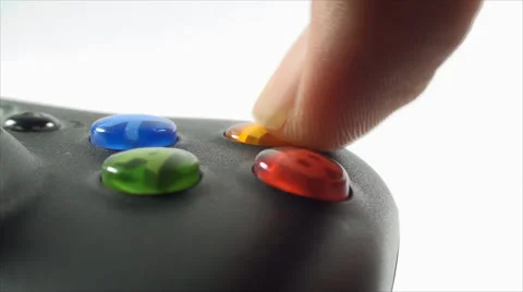 Finger Touching The Y Button On A Gaming... | Stock Video | Pond5