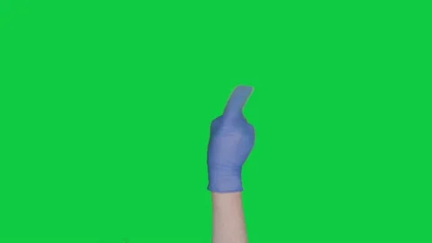 Finger wag gesture. Isolated blue nitril... | Stock Video | Pond5