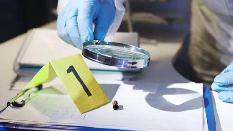 Fingerprint examination on gun with magn... | Stock Video | Pond5