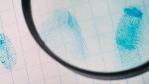 fingerprint on a sheet of paper is seen ... | Stock Video | Pond5