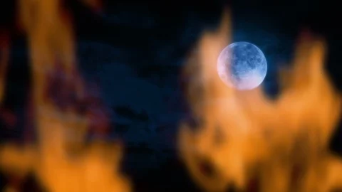 Fire And Moon At Night | Stock Video | Pond5