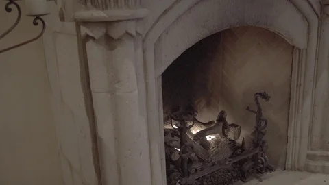 Fire Blazing in Stone Fireplace with Pil... | Stock Video | Pond5