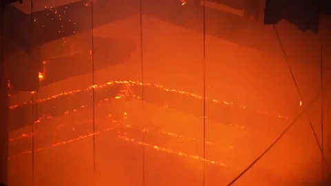 Fire in building at night time | Stock Video | Pond5