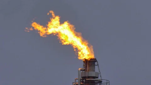 Fire Burning on Top of Gas Flare Stack C... | Stock Video | Pond5