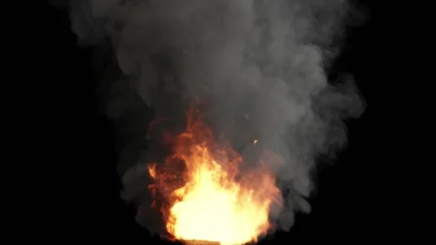 The fire burns, emitting smoke, on a bla... | Stock Video | Pond5