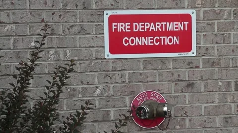 fire department connection sign on beige... | Stock Video | Pond5