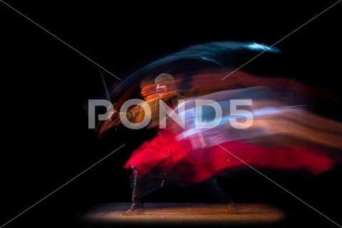 Fire, energy. Portrait of brutal serious man, medieval knight or ...