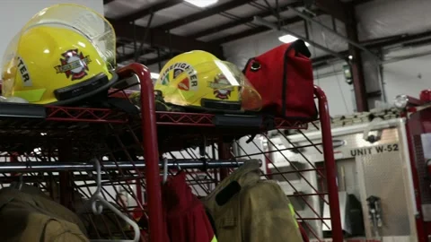Fire engine and firefighter's helmets on... | Stock Video | Pond5