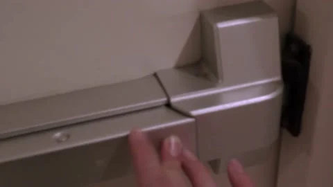 Fire exit door. Man hand open the fire d... | Stock Video | Pond5
