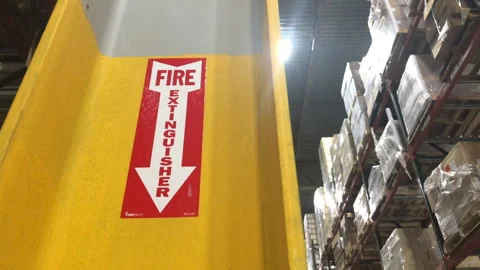 Fire Extinguisher Locator Sign In Wareho... | Stock Video | Pond5