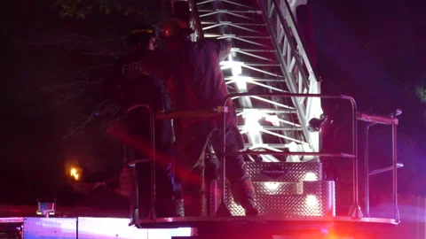 Fire fighting hero analysing situation o... | Stock Video | Pond5