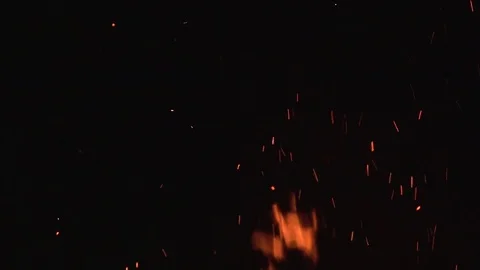 fire flames and glowing ash particles ba... | Stock Video | Pond5