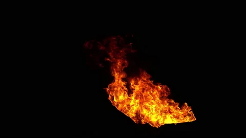 Fire in a hole in the ground, black back... | Stock Video | Pond5