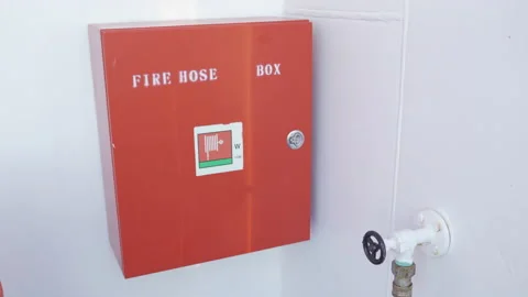 Fire hose box mounted on a wall | Stock Video | Pond5