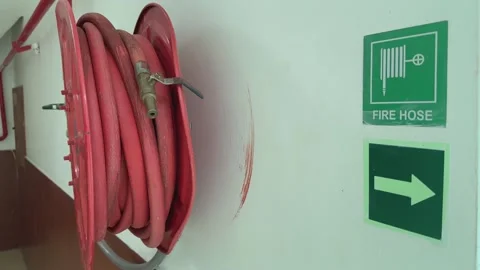 Fire hose storage at a building, Red fir... | Stock Video | Pond5
