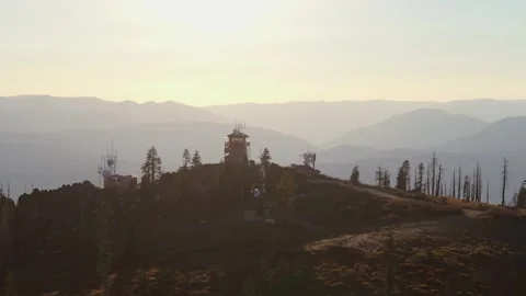 Fire lookout tower on a mountain ridge s... | Stock Video | Pond5