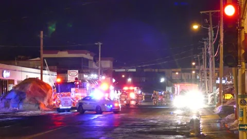 Fire scene with police car and firetruck | Stock Video | Pond5