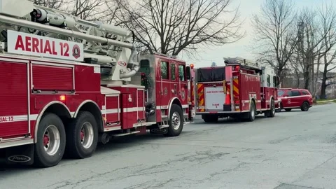 Fire trucks with flashing lights came to... | Stock Video | Pond5