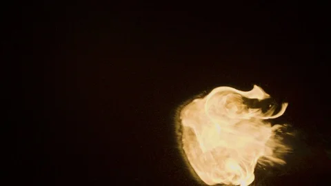 Fireball floating in front of a black ba... | Stock Video | Pond5