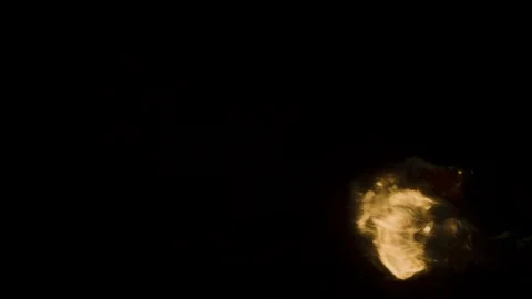 Fireball floating in front of a black ba... | Stock Video | Pond5