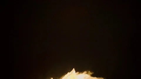 Fireball floating in front of a black ba... | Stock Video | Pond5