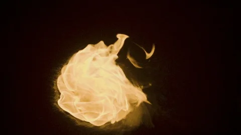 Fireball floating in front of a black ba... | Stock Video | Pond5