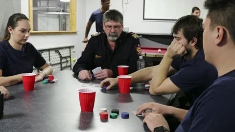 Firefighters playing poker in fire stati... | Stock Video | Pond5