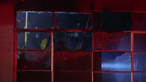 Firefighters pull down ceiling from burn... | Stock Video | Pond5