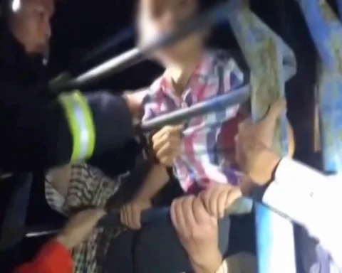Firefighters rescue boy with head stuck ... | Stock Video | Pond5