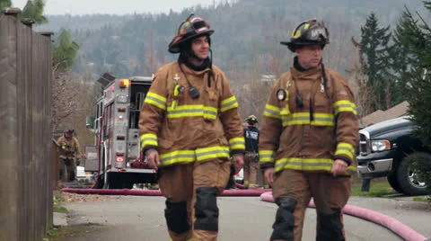 Firefighters shaking hands, fire engine,... | Stock Video | Pond5