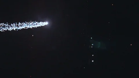Firework Shooting into Night Sky and Exp... | Stock Video | Pond5