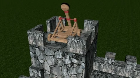 Firing catapult to the castle tower | Stock Video | Pond5