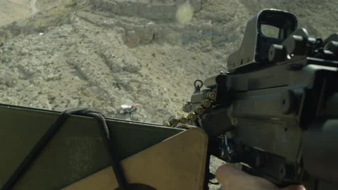 Firing Large Caliber Machine Gun Out of ... | Stock Video | Pond5