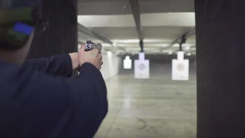 Firing Side Arm Pistol Indoor Gun Range ... | Stock Video | Pond5