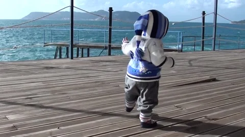 First awkward gaits near the sea-, Cryst... | Stock Video | Pond5