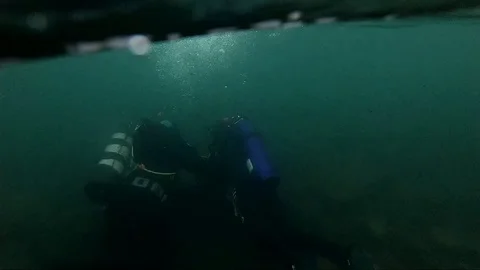 first dive in cold water, diving instruc... | Stock Video | Pond5