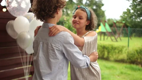 First love, classmates in love. Cute boy... | Stock Video | Pond5