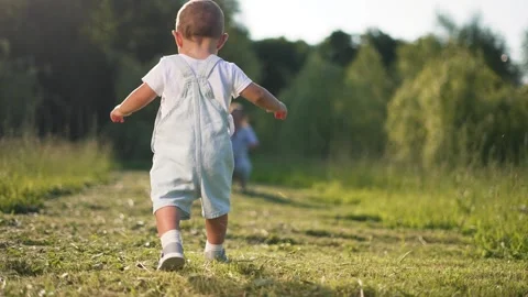 First steps. Childhood dream concept. Ha... | Stock Video | Pond5