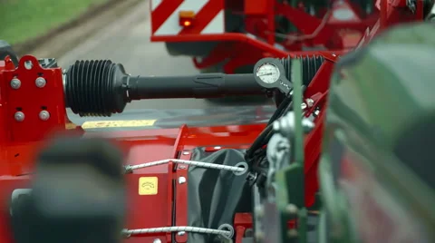 First tractor with its hay turning machi... | Stock Video | Pond5