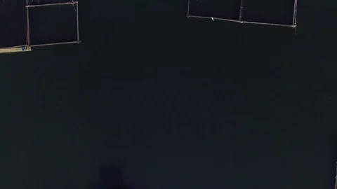 Fish cages and shanty house built at the... | Stock Video | Pond5