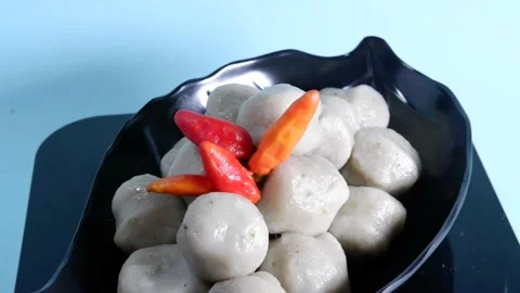 Fish Meatball on blue background | Stock Video | Pond5