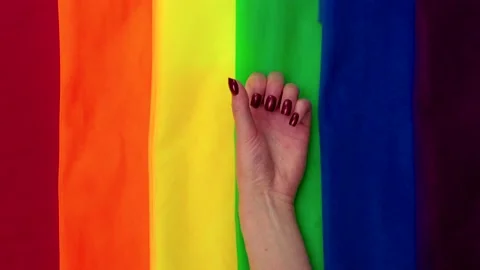 fist hand of female on the multi color f... | Stock Video | Pond5