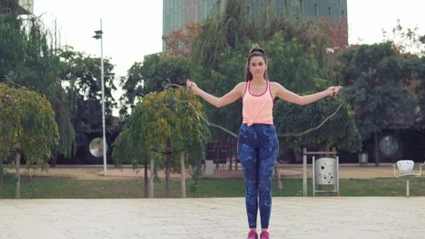 Fit beautiful woman with jumping rope in... | Stock Video | Pond5