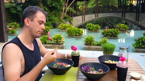 Fit man eating healthy food rich in prot... | Stock Video | Pond5