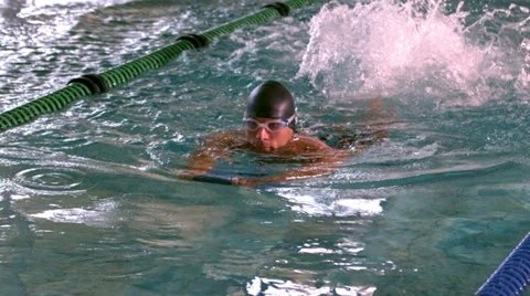 Fit muscular swimmer swimming in the poo... | Stock Video | Pond5