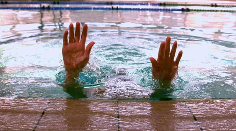 Fit swimmer emerging from pool and pulli... | Stock Video | Pond5