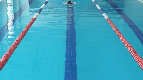 Fit swimmer girl jumping and cheering in... | Stock Video | Pond5