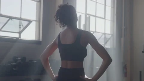 Fit Woman Shaking Out Her Body in Betwee... | Stock Video | Pond5