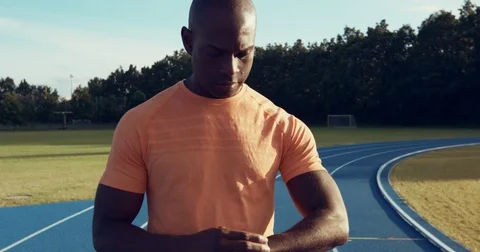 African Checking Time Stock Footage ~ Royalty Free Stock Videos | Pond5