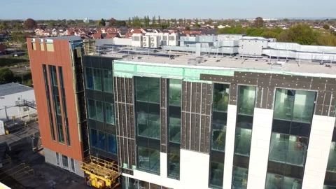 Fitting Exterior Cladding to Modern Offi... | Stock Video | Pond5